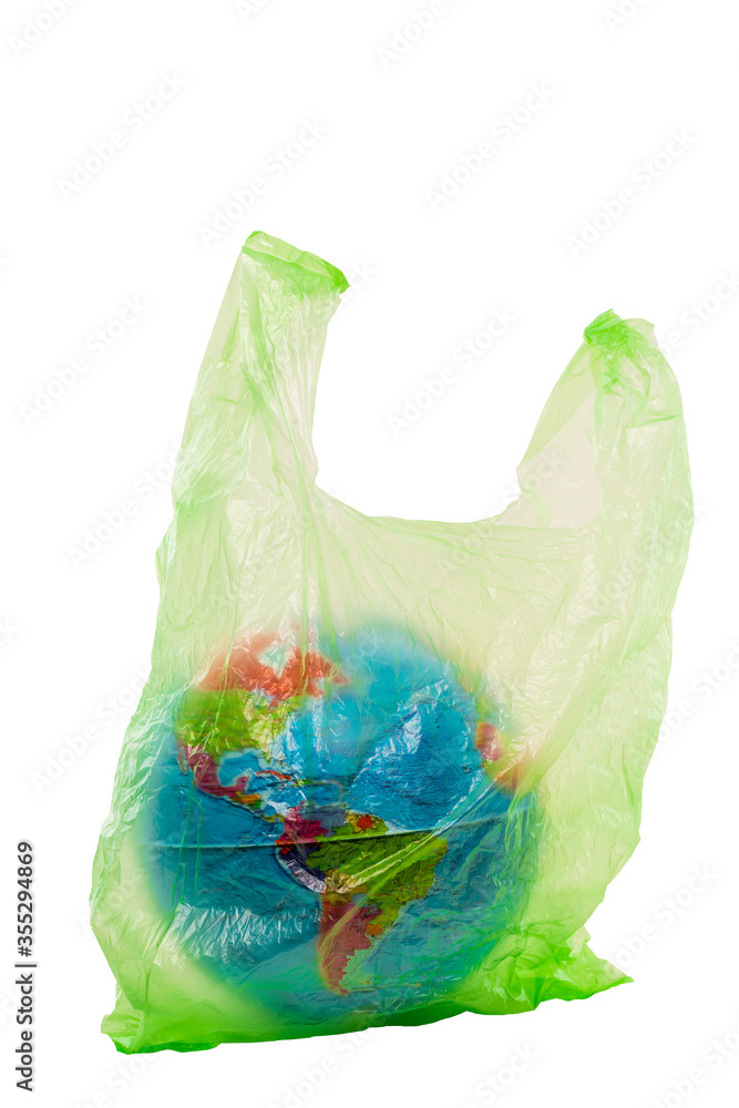 Little planet earth globe in plastic bag on the white background ...