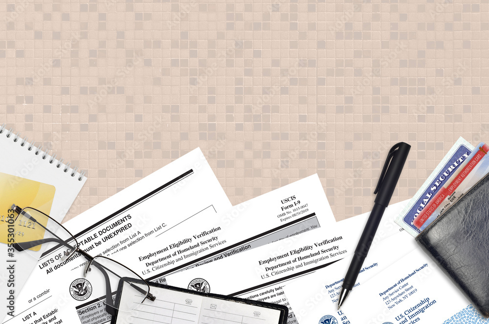 USCIS form I-9 Employment eligibility verification lies on flat lay ...