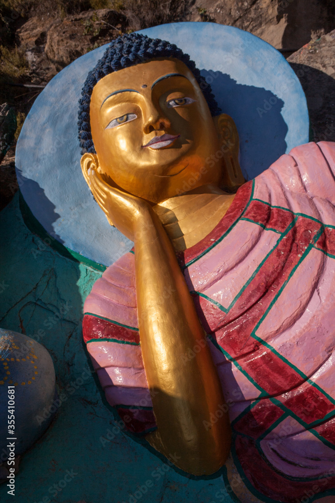 Vertical view of statue showing Sleeping lion's posture or Reclining ...