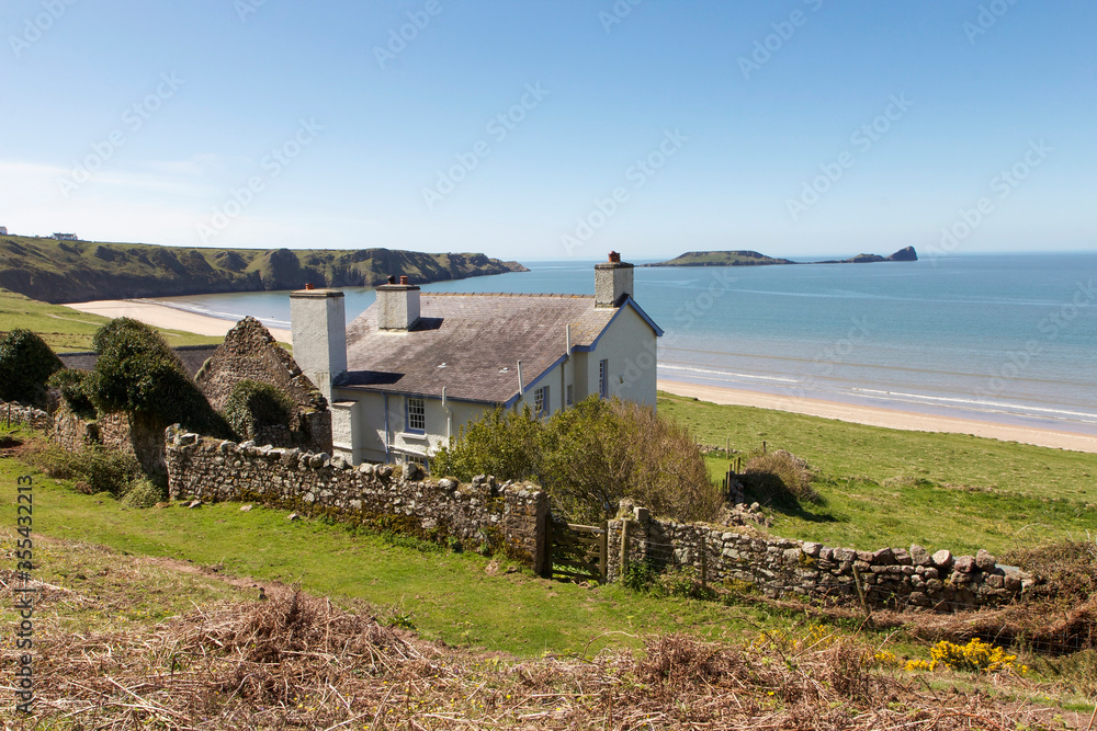 White detached cottage in a rural location. The farmhouse is set in the ...