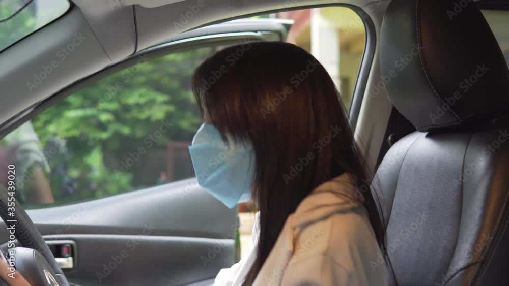 Footage B roll of Thailand Women wearing mask Cleaning car By Spraying ...