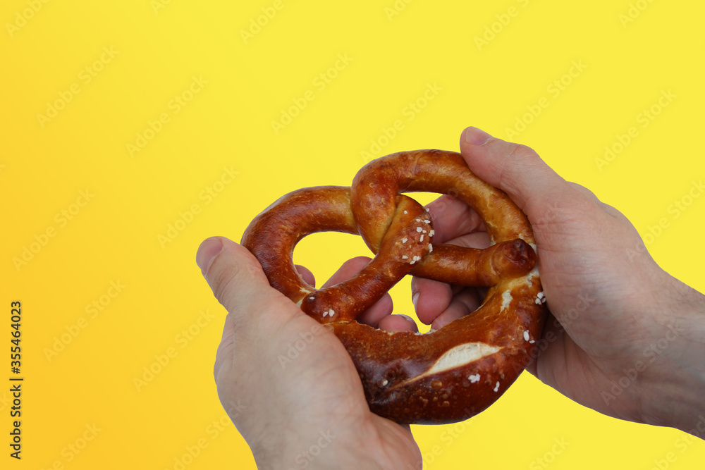 beautiful freshly baked pretzel, German national dish with a golden ...