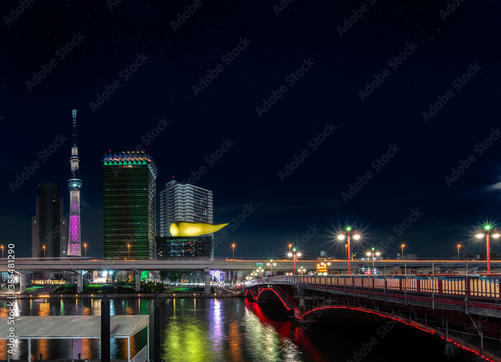 Night view of the Azuma bridge on Sumida river leading to the Tokyo ...