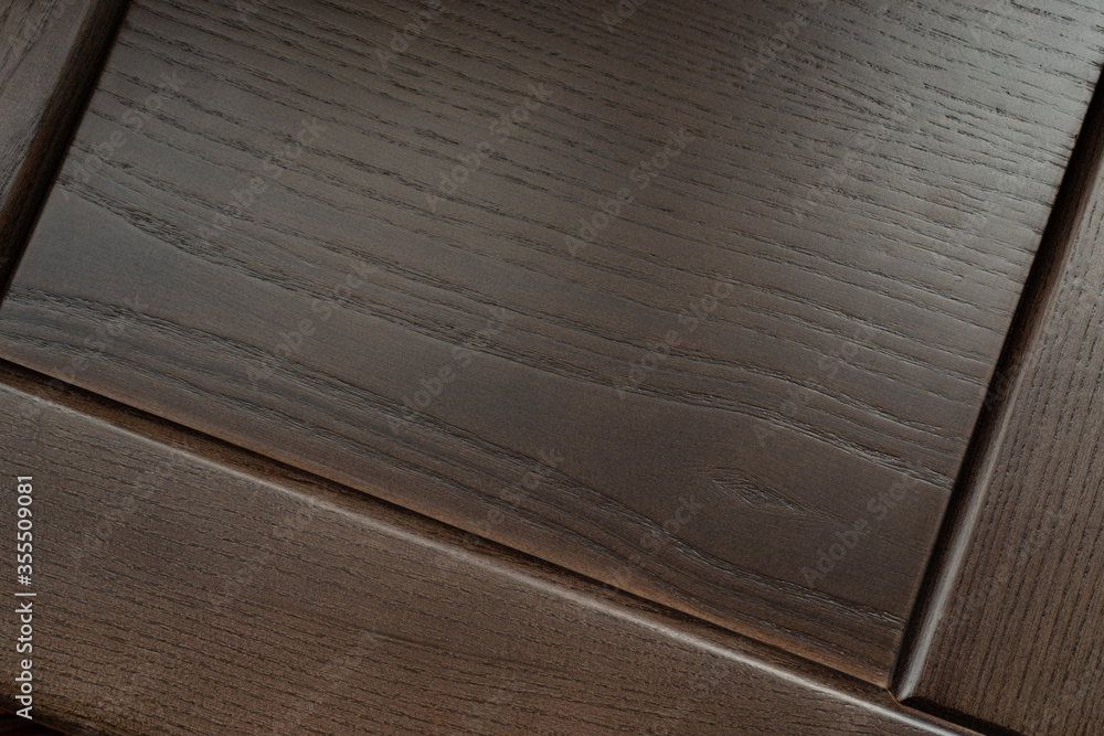 Details of wooden panels from a dark solid wood of wenge color for ...