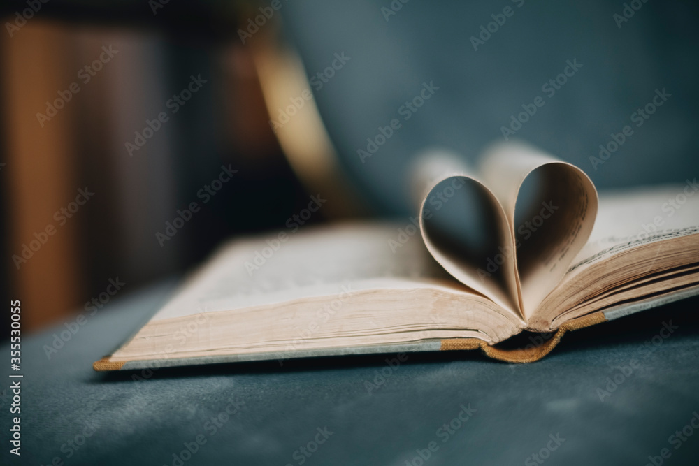 The pages of a book formed into a heart. Concept Love of reading and ...