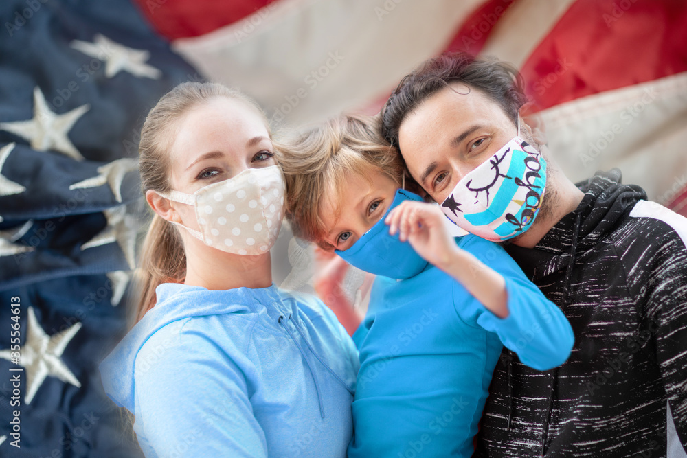 Family members embracing each other, smiling in the camera wearing ...