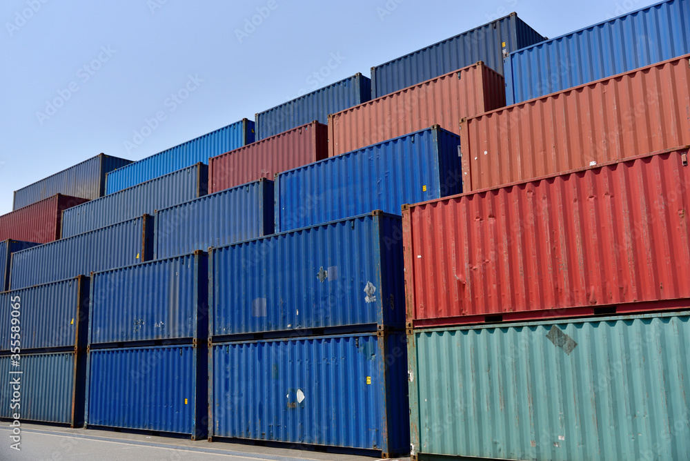 Stacked cargo at maritime transport terminal: shipping industry Stock ...