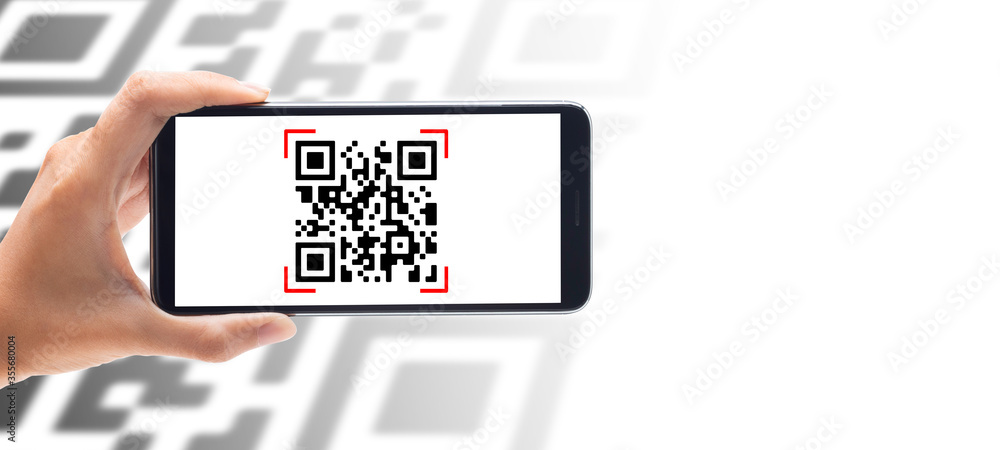 Hand using mobile smart phone scan Qr code on banner background ...