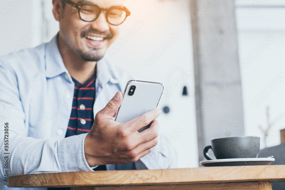 using cell phone.hand man holding texting message on screen mobile ...
