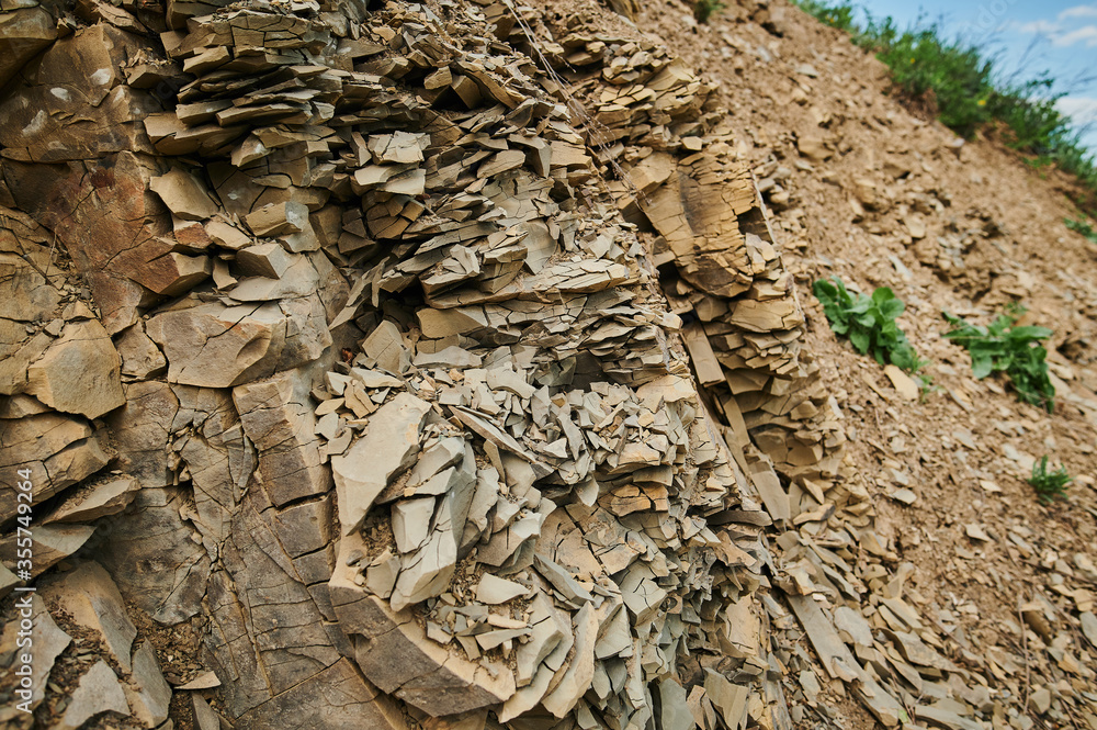 Layers of soil with groundwater. Details of earth layers in a clay pit ...