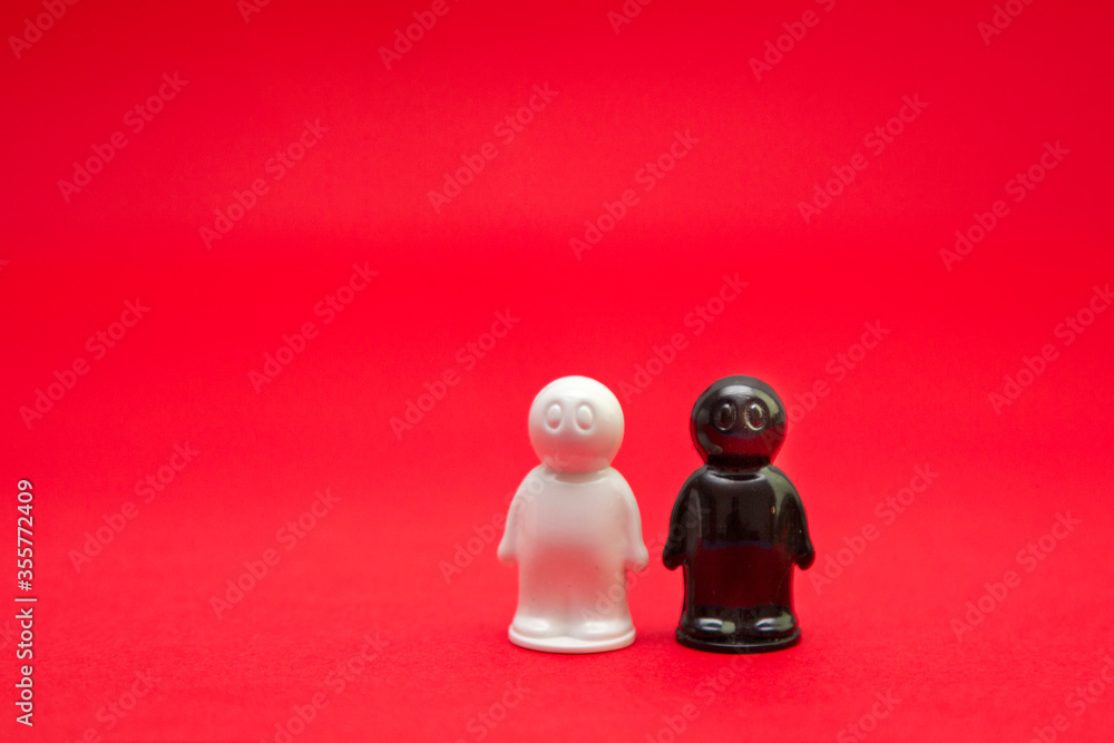 a pair of people with different skin colors, different nationalities ...