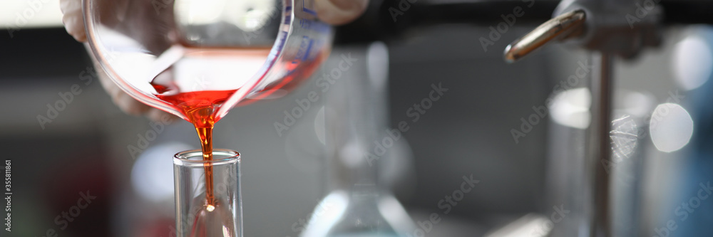 Chemical experiments with colored liquid in laboratory. Simple chemical ...