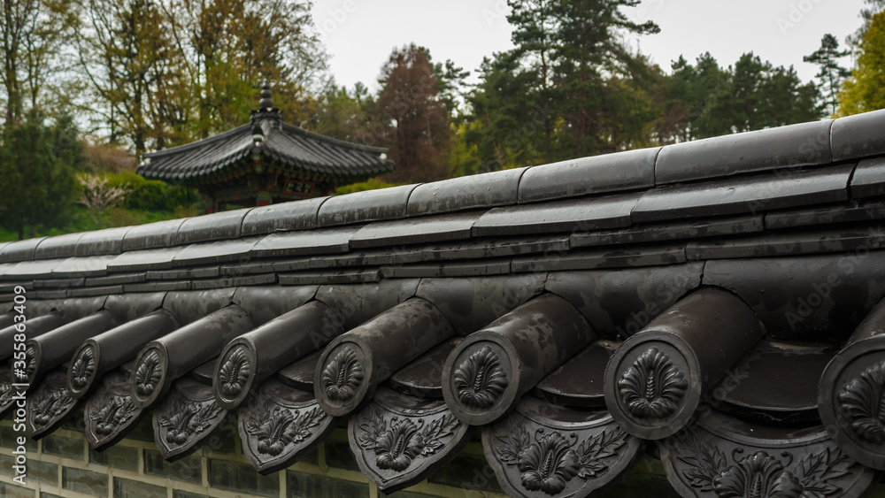 Chinese style roof element with tiling. Shallow depth of field photo ...