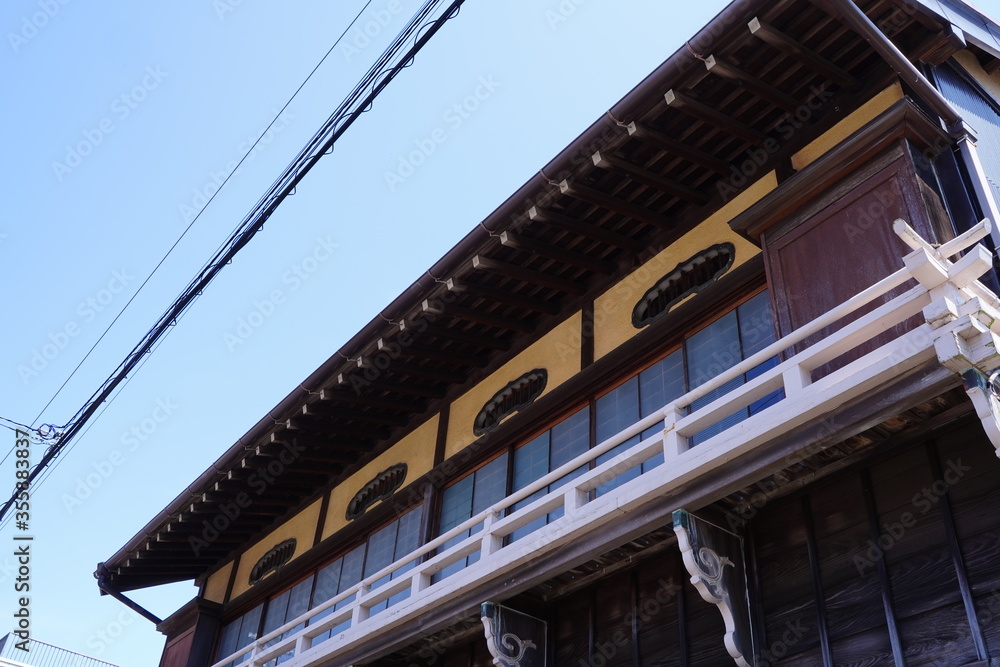 Japanese old style Architecture with yellow wall and big windows at ...