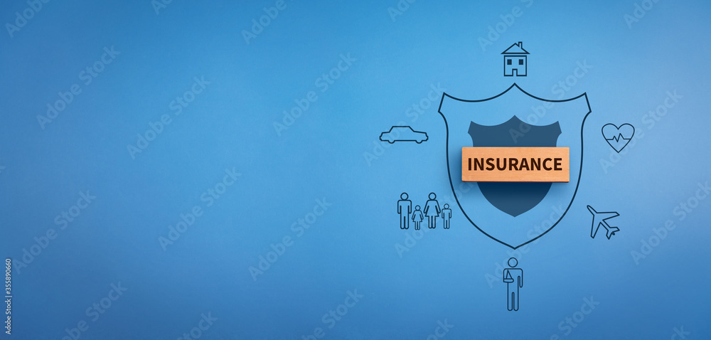 wooden block with text insurance, icons and shield icon at background ...