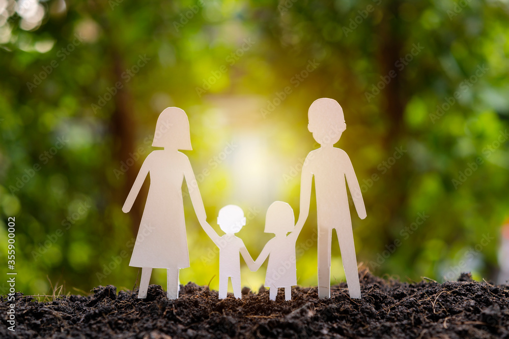 Family paper cut with a flower background on the ground Stock Photo ...