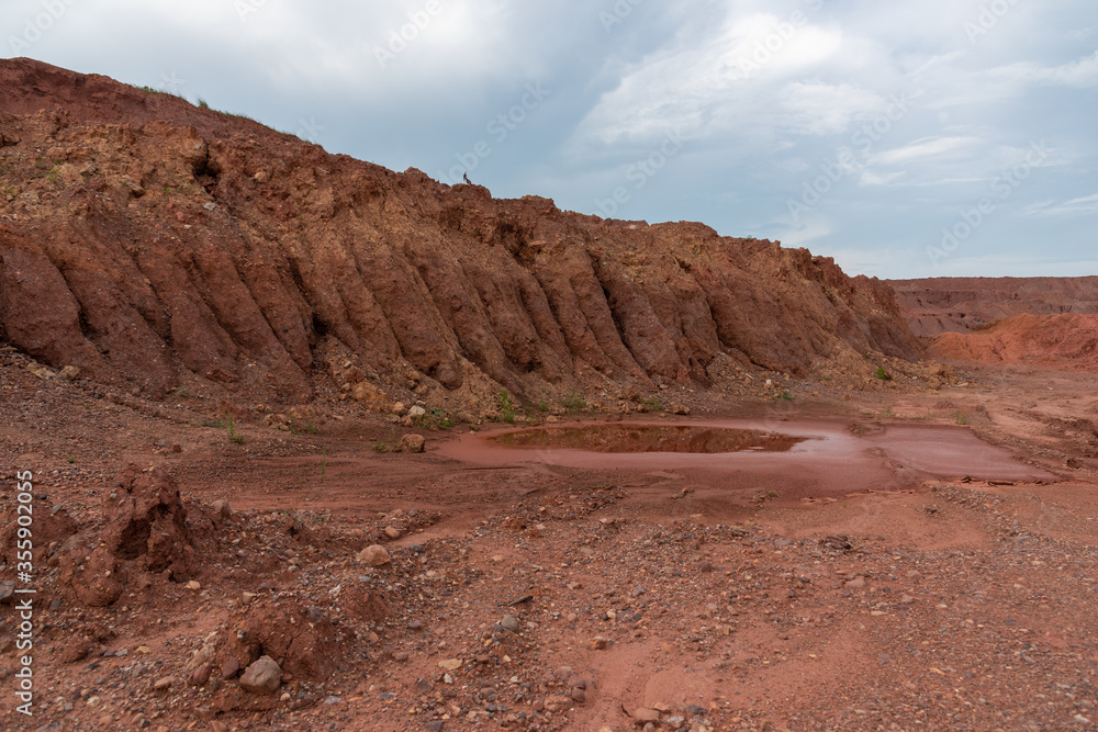 Wilderness mud mound and stagnant water landscape Stock Photo | Adobe Stock