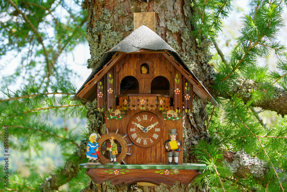 Schonach / Germany - May 17, 2020: Handcrafted wooden cuckoo clock ...