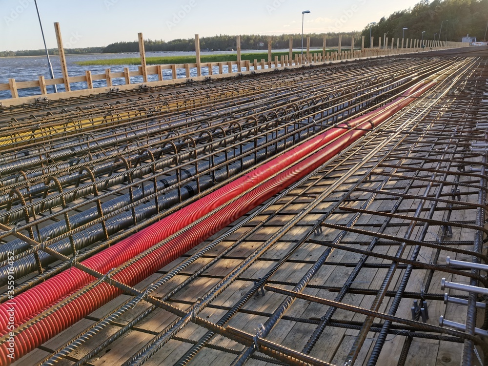 Bridge construction work. Pouring the foundation of the bridge ...