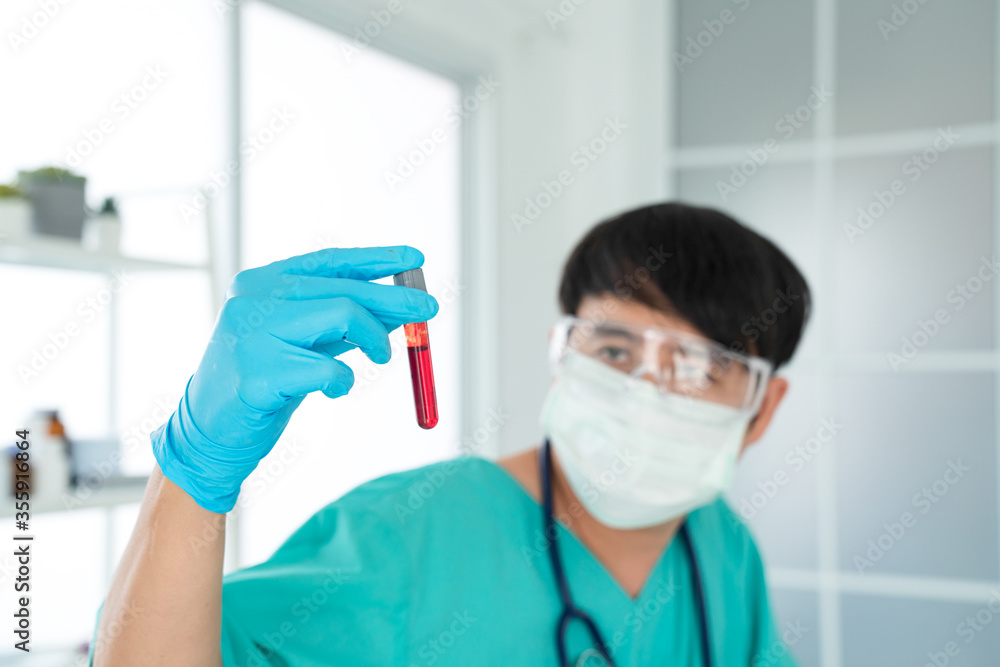 Doctor Hand holding test tube. Asian doctor holding virus and bacteria ...