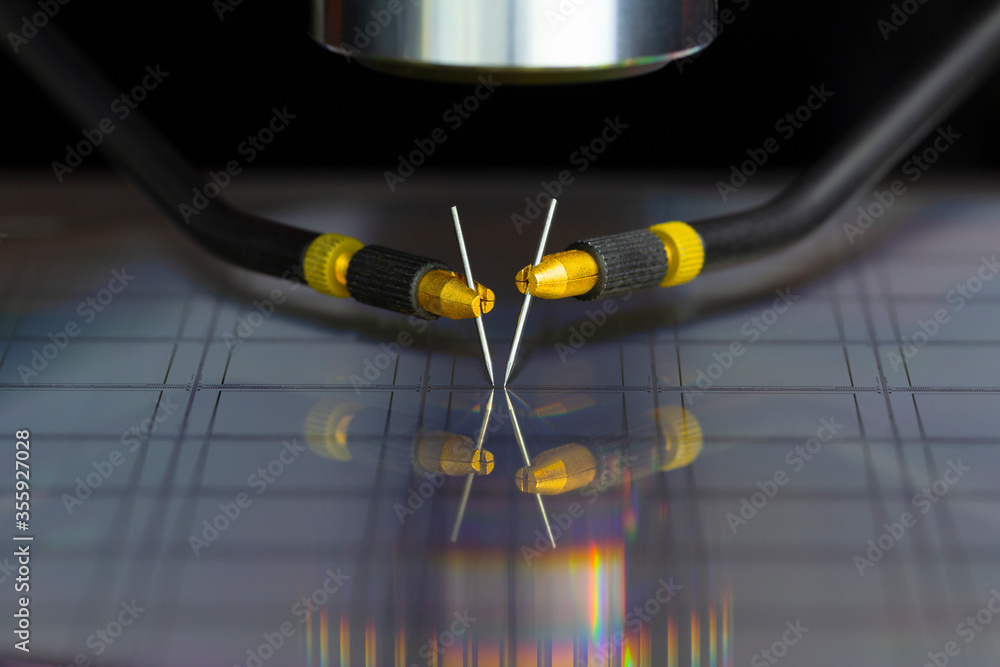 Manual probe system with needles for test of semiconductor on silicon ...