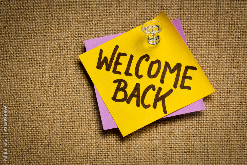 welcome back - handwriting on a sticky note, business reopening concept ...