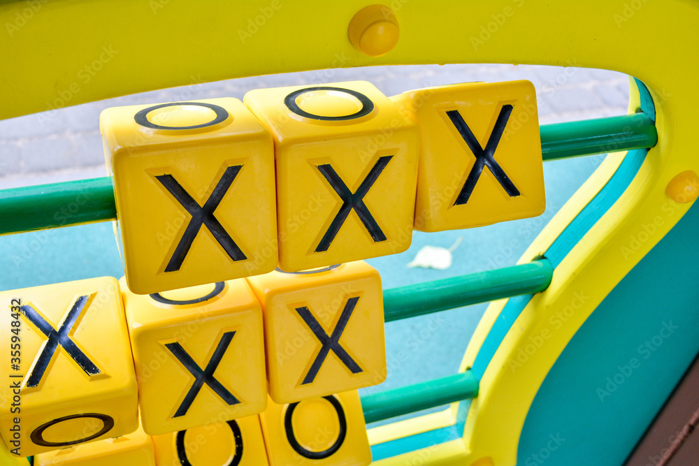 Tic-tac-toe puzzle game on playground for children education and ...