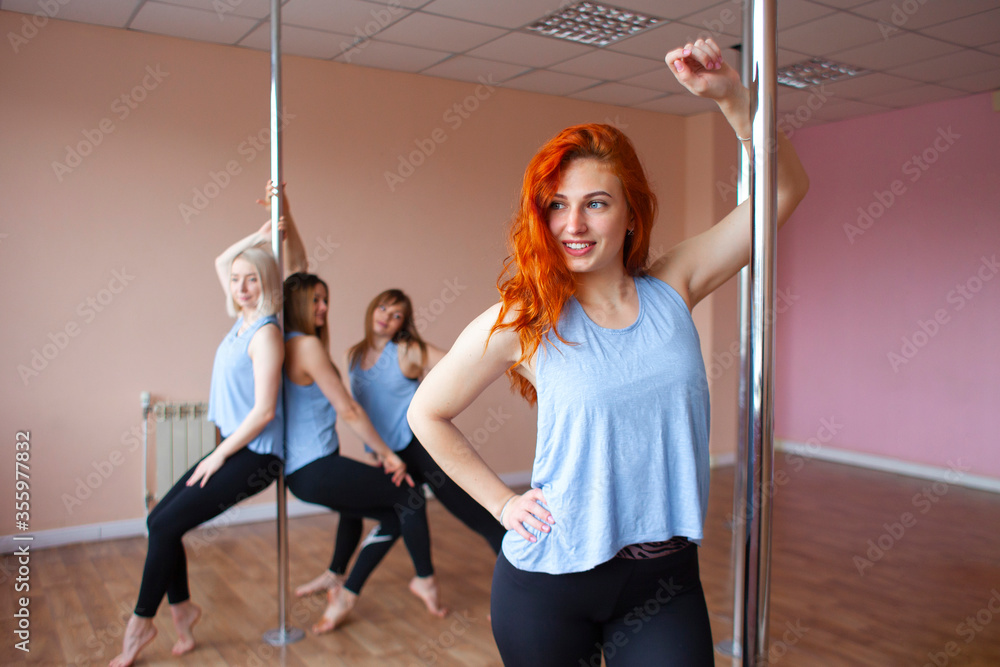 pole dance team, sports girls doing pylon gymnastics Stock Photo ...