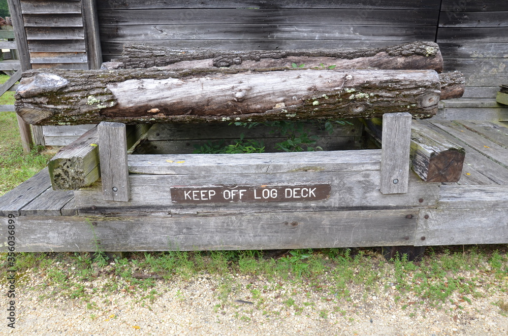 keep off log deck sign with wood structure and logs Stock Photo | Adobe ...