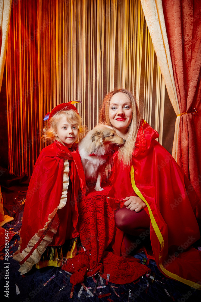 Family with dog during stylized theatrical circus photo shoot in ...