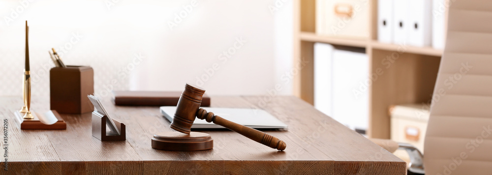 Table with judge gavel in lawyer's office. Banner design Stock Photo ...
