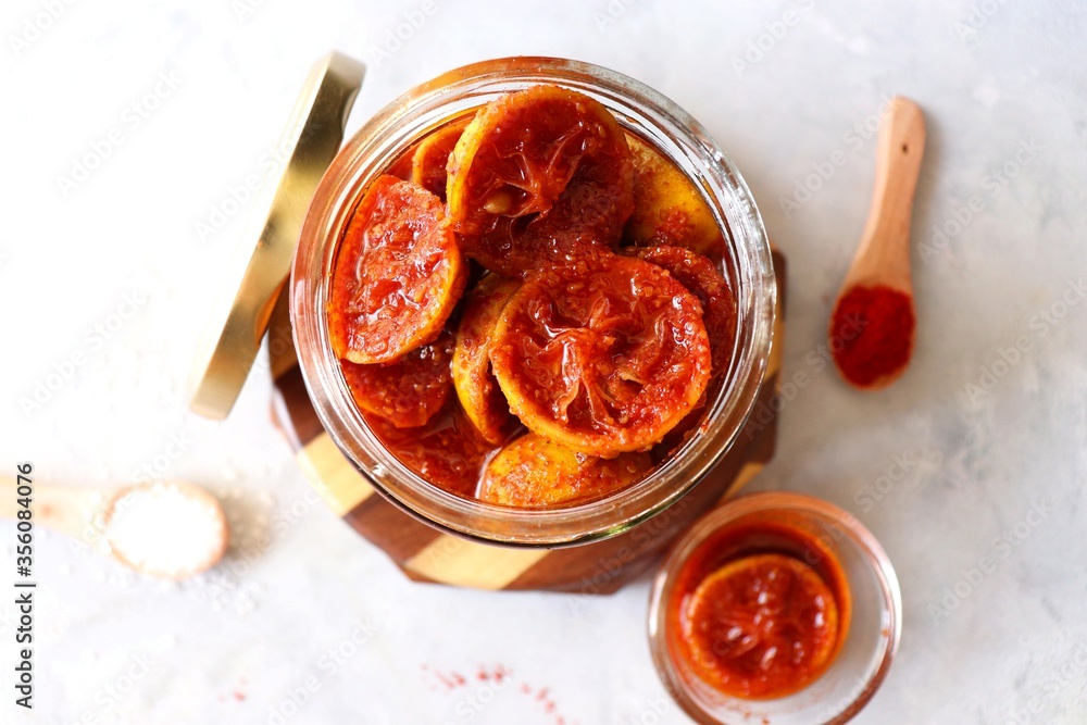 Indian traditional homemeade sweet, tangy and spicy lemon pickle or ...