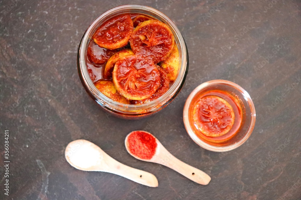 Indian traditional homemeade sweet, tangy and spicy lemon pickle or ...