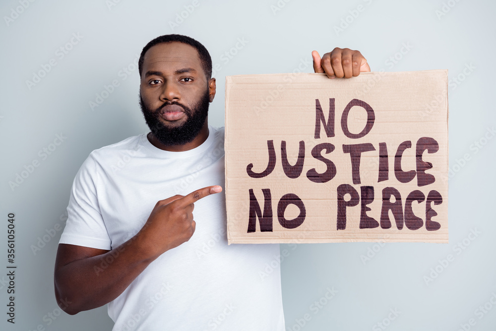 No justice no peace. Photo of disappointed dark skin african protester ...