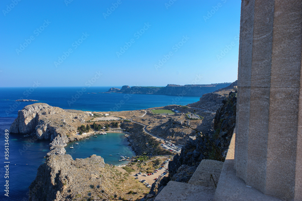 View from the ancient wall of the citadel of the Acropolis of Lindos on ...
