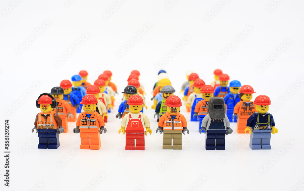 HONG KONG, NOV 2: A group of workers lego mini characters from ...