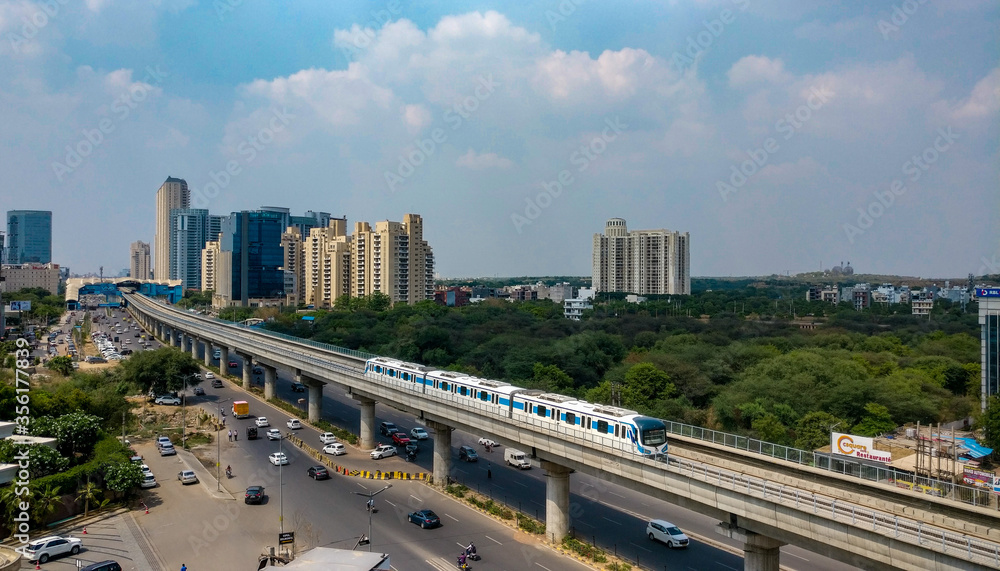 Aerial shot of Rapid metro tracks in urban areas of Delhi NCR, Gurgaon ...