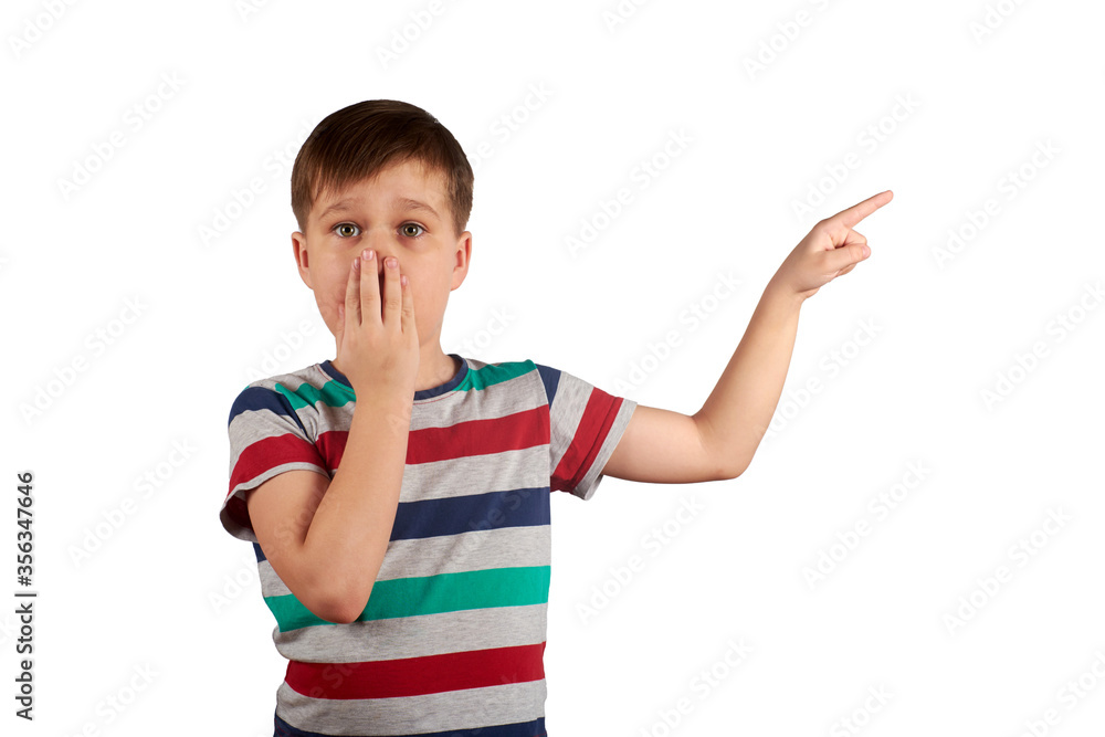 Shocked boy pointing with his finger on something, isolated on white ...