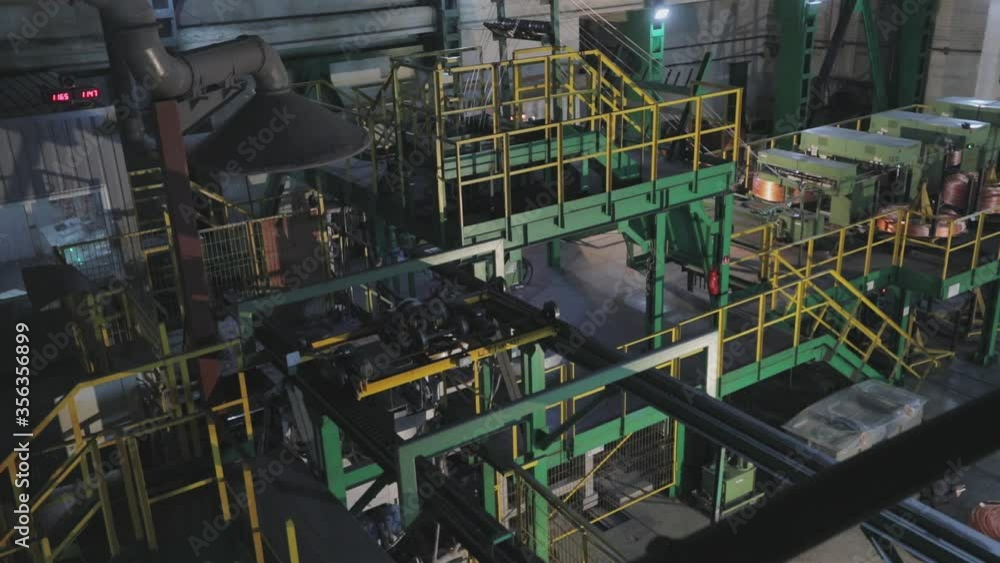 Automated copper feed line to the furnace. The melting of copper in the ...