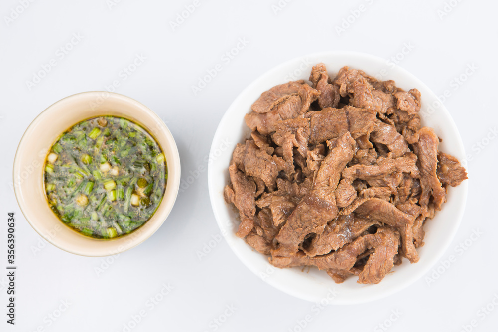 isolated close up flat lay top view shot of a bowl of sliced beef ...