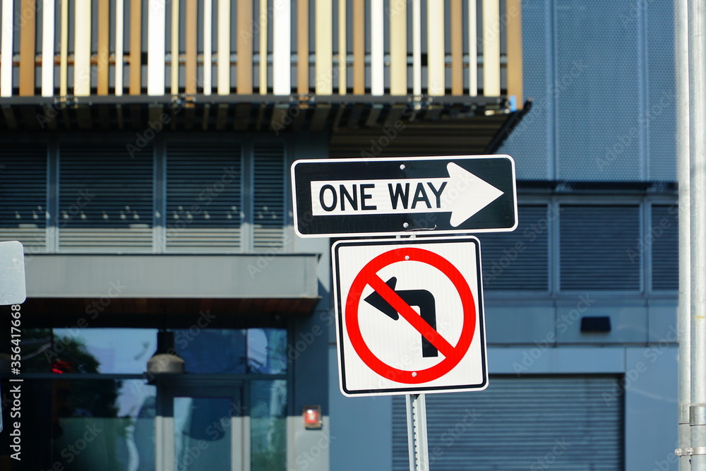 One way street sign n Manhattan, New York City, USA and Do not turn ...