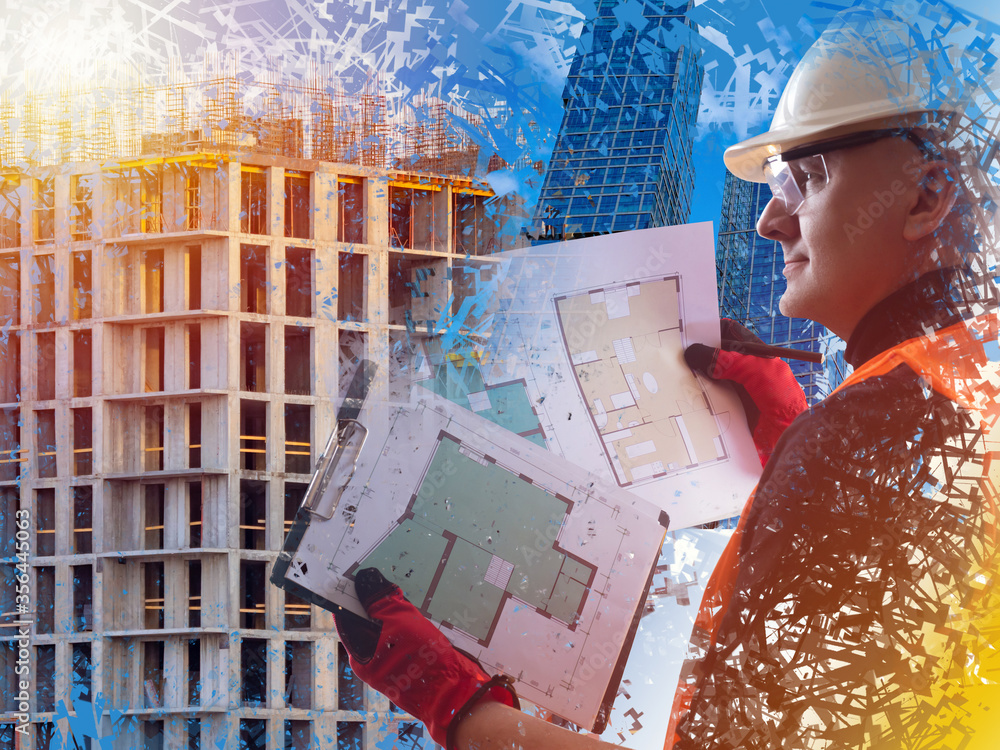 Builder. A man works in a construction company. Builder holds the ...