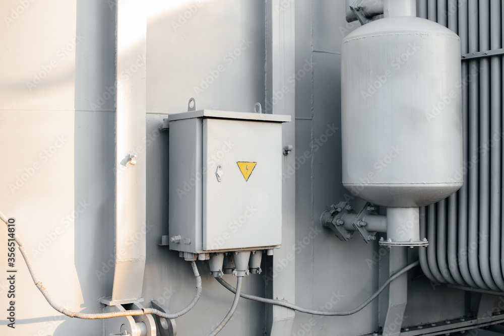 Expansion tank of a power transformer at an electrical substation ...