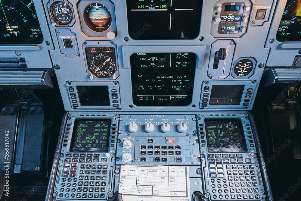 Fire buttons on control panel in cockpit Stock Photo | Adobe Stock