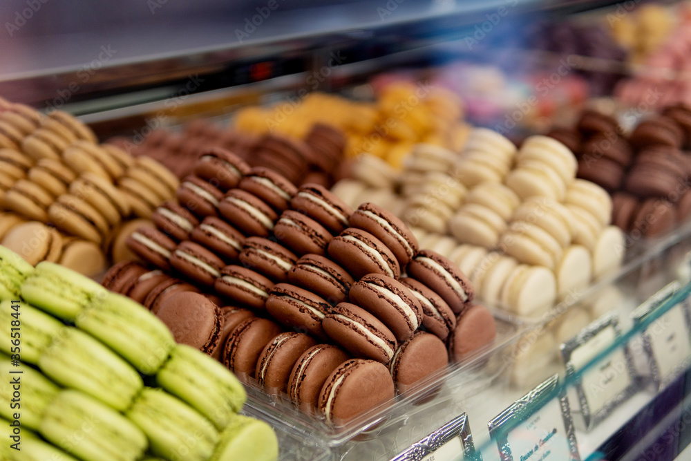 Foto De Many Colorful Tasty Macaroons Of Different Colors With Various Fillings And Tastes