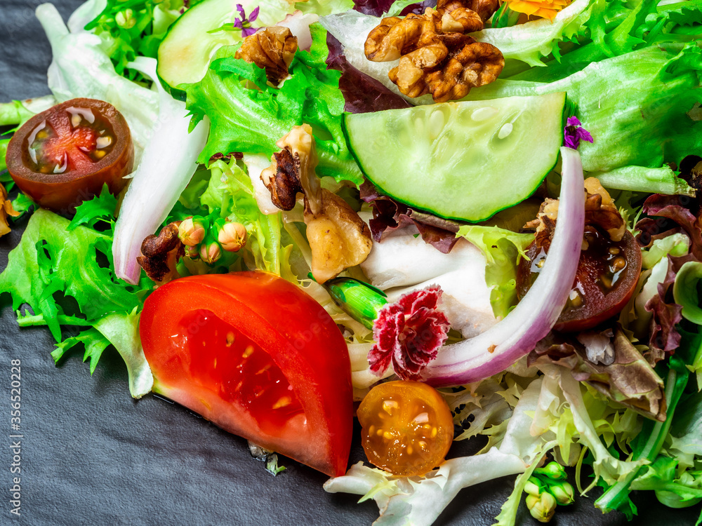 Salad of different types of lettuce Stock Photo | Adobe Stock