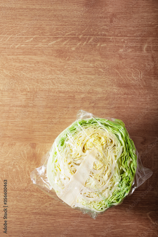 cabbage vegetable in plastic bag. single use plastic packaging issue ...