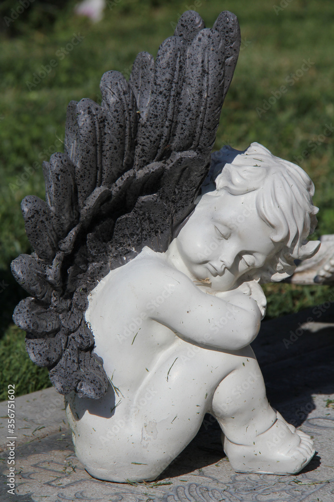 statue of baby angel Stock Photo | Adobe Stock