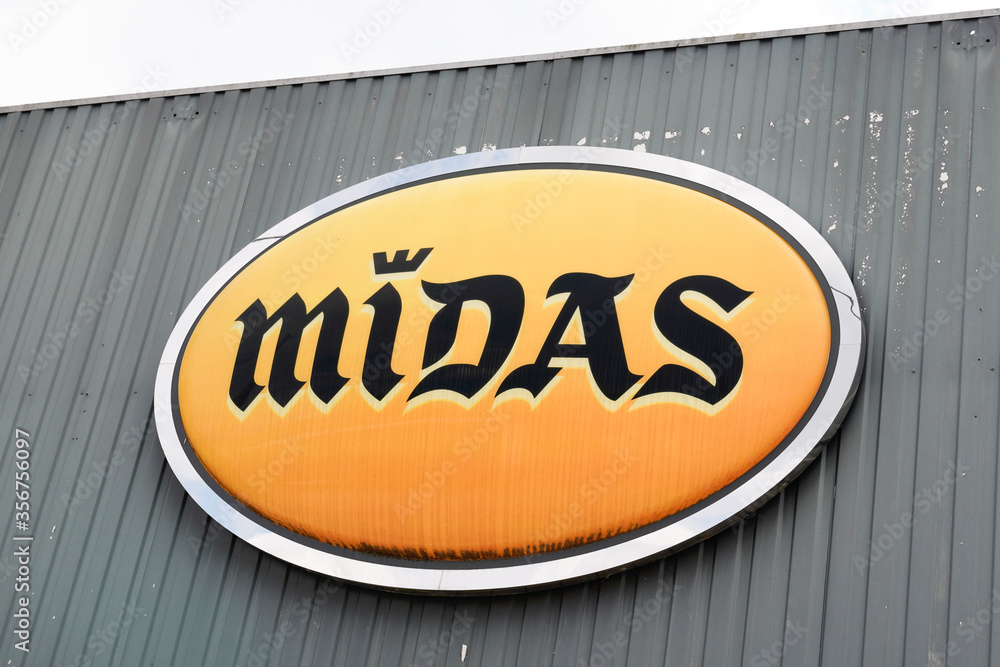 Midas car service facility yellow logo and shop sign for automotive ...