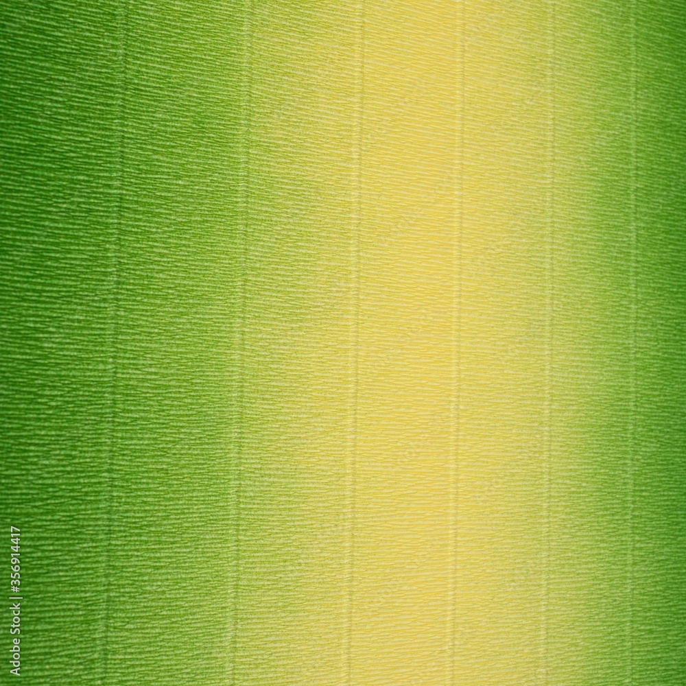 Crepe wrinkled paper texture with yellow and green gradient pattern ...